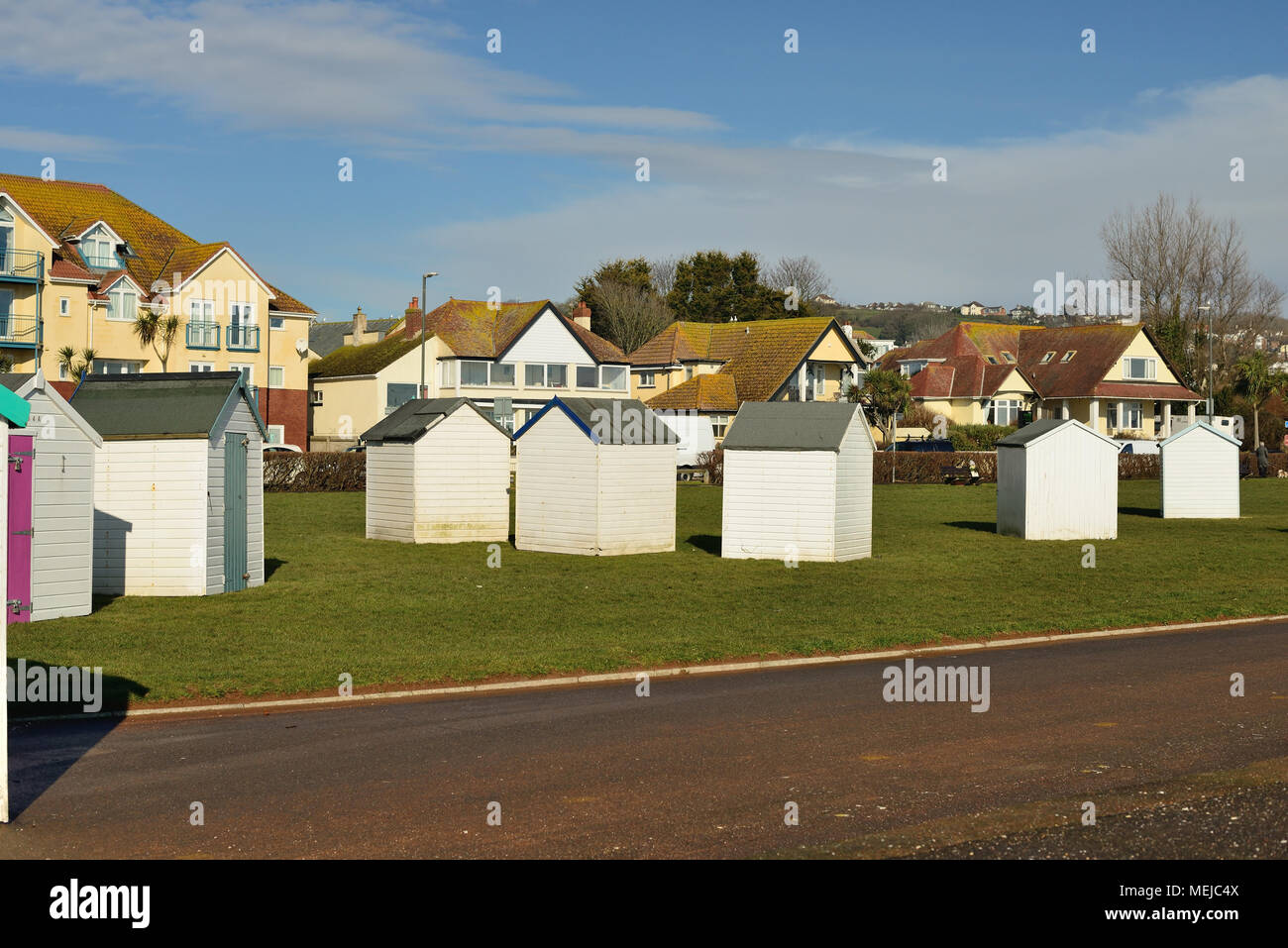 Beach huts displaced by stormy weather Stock Photo - Alamy