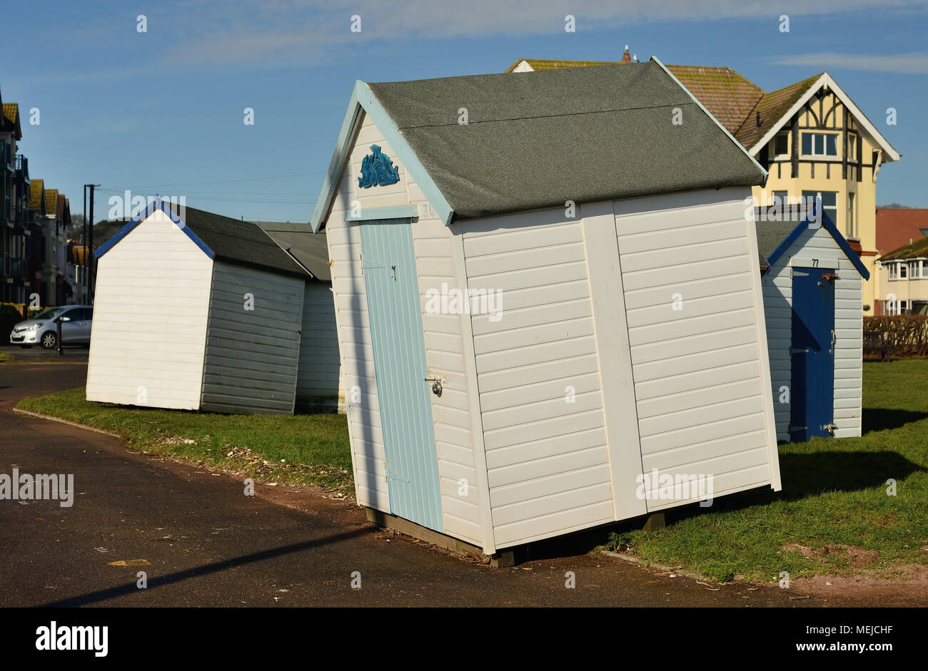 Beach huts displaced by stormy weather Stock Photo - Alamy