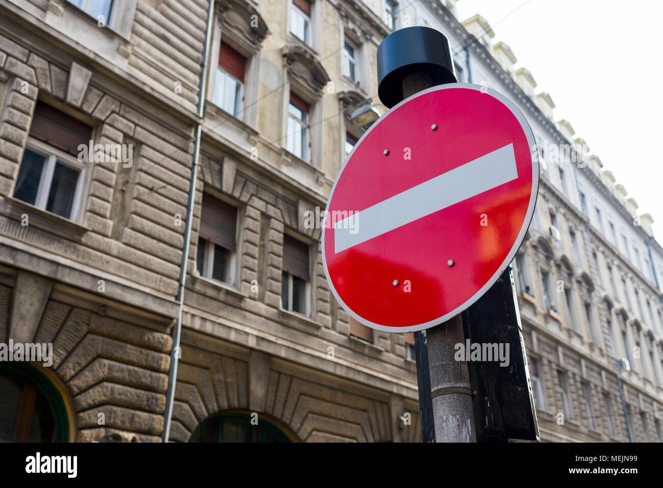 car stop sign in the city on a building background Stock Photo - Alamy