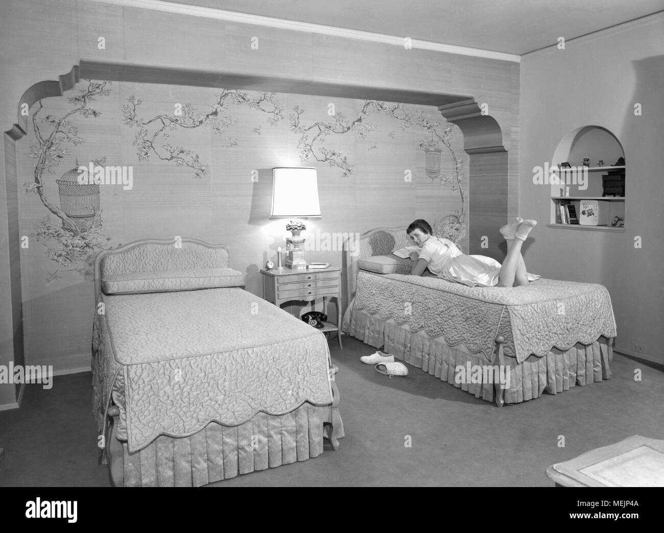 A Teen Aged Girl Relaxes In Her Bedroom In A Southern California Home