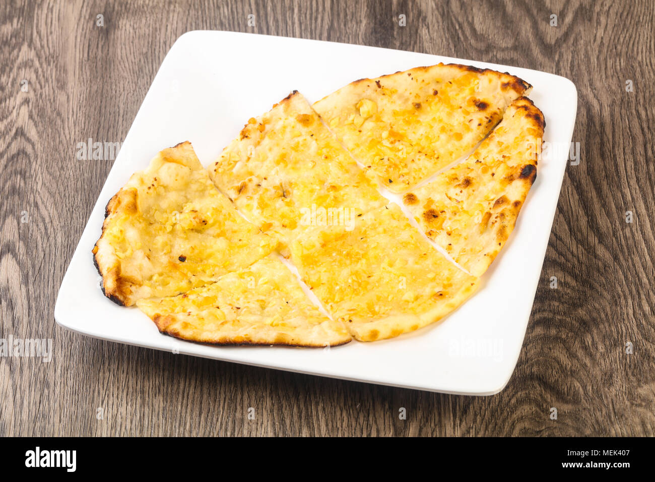Indian bread - Naan with cheese and garlic Stock Photo - Alamy