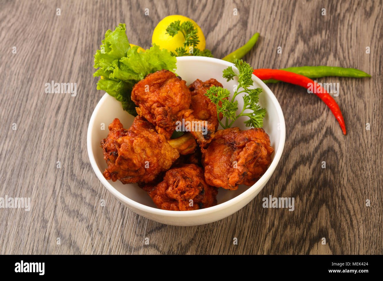 Indian traditional cuisine - Chicken lollipops with spices Stock Photo ...