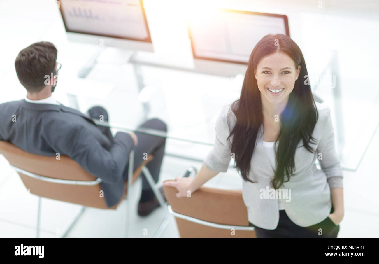 successful business woman standing near modern workplace Stock Photo ...