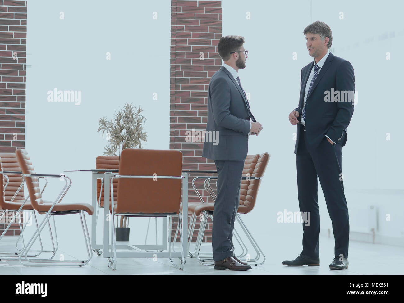 Two business executives talking hi-res stock photography and images - Alamy