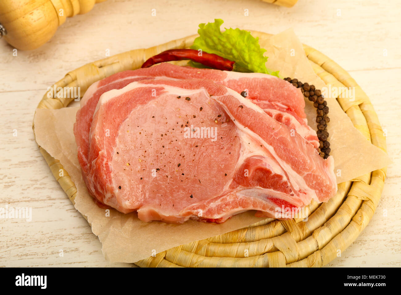 Raw pork cutlet with pepper and salt ready for cooking Stock Photo - Alamy