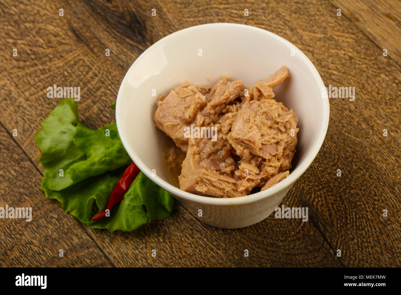 Canned tuna fish in the bowl ready for cooking Stock Photo - Alamy