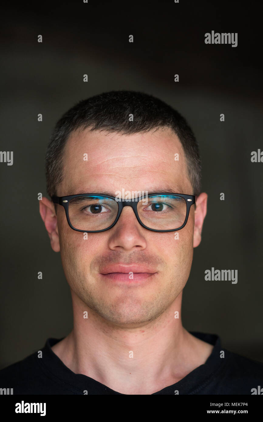 Portrait of young handsome black-haired confident successful ...