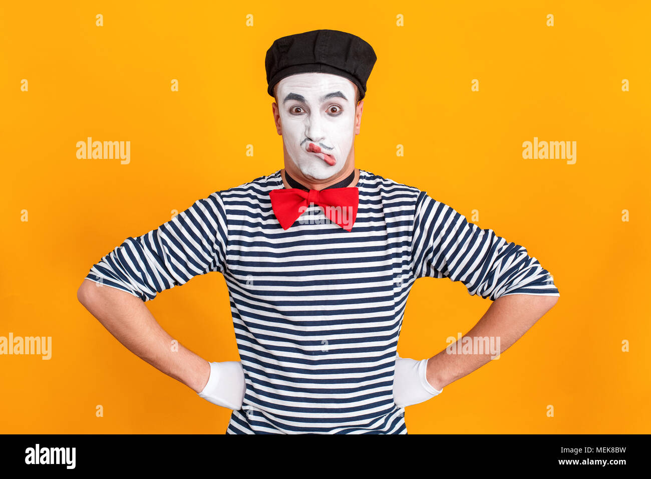 Mime man making stupid and funny face at camera Stock Photo - Alamy