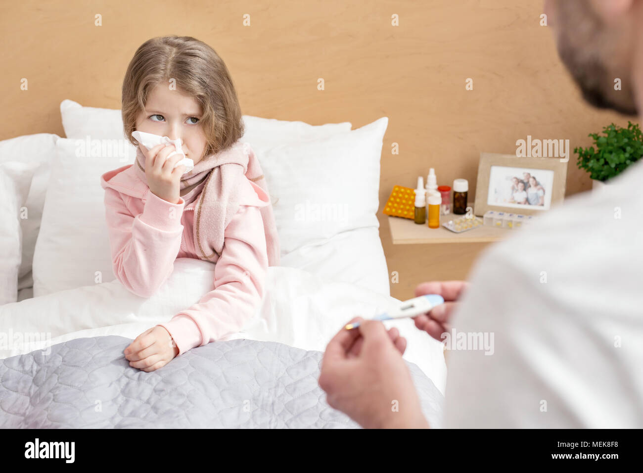Sick child having a high fever Stock Photo - Alamy