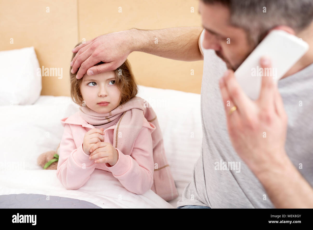 Father help kid on phone hi-res stock photography and images - Alamy