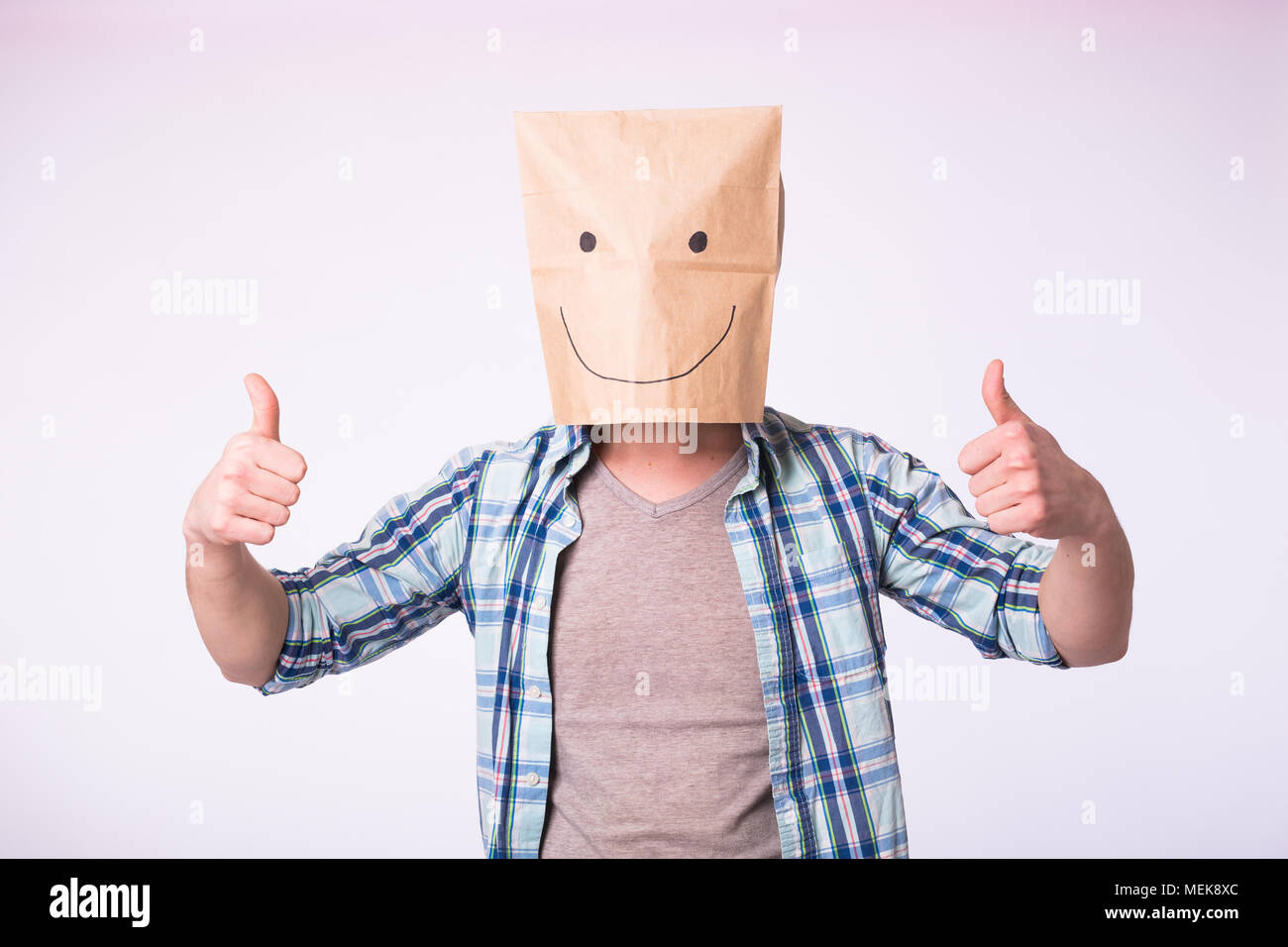 Smiley face on thumb hi-res stock photography and images - Alamy