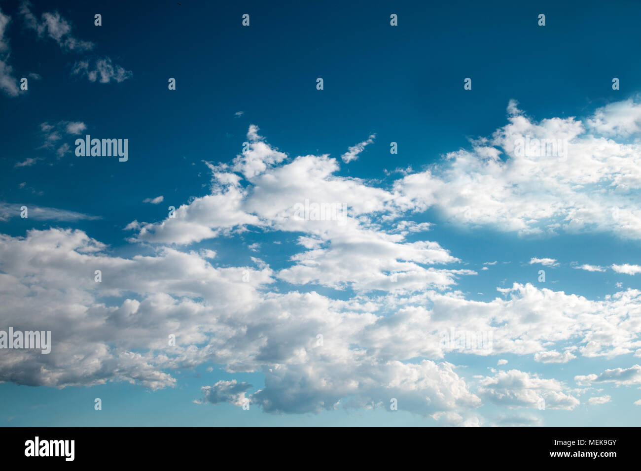 Blue sky background with brush strokes clouds Stock Photo - Alamy