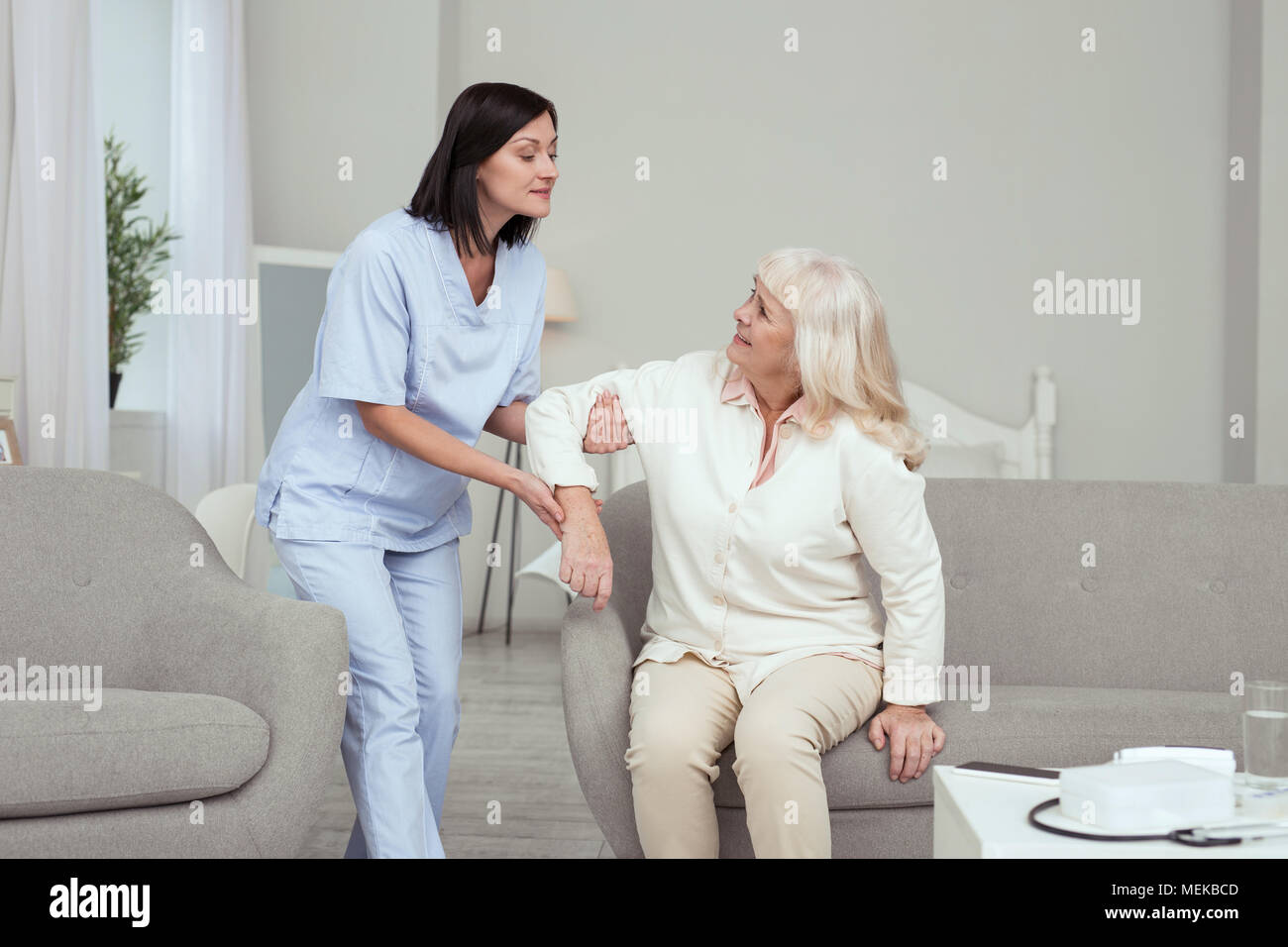 Worried elder woman asking for help Stock Photo - Alamy