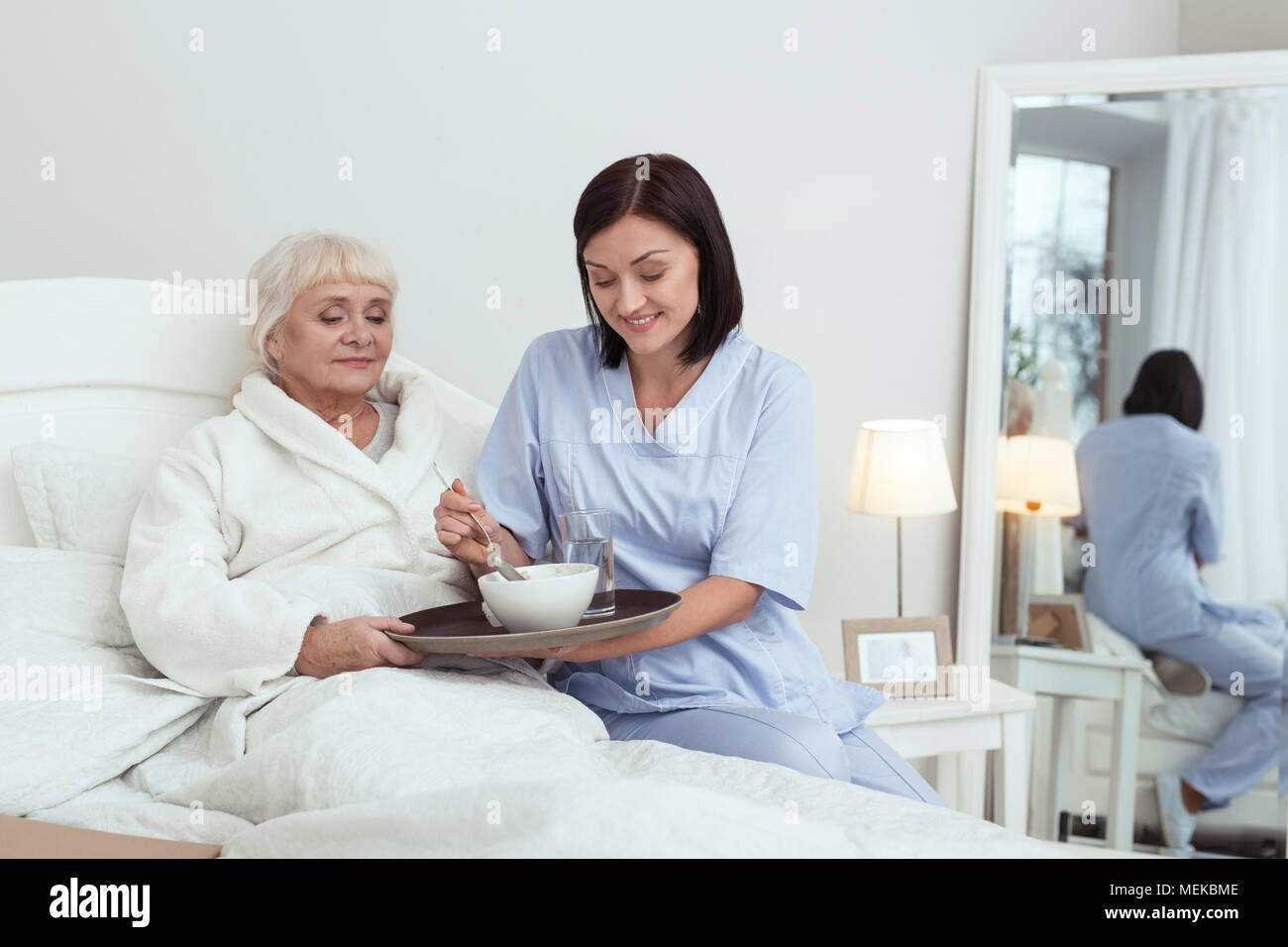 Caregiver and food hi-res stock photography and images - Alamy