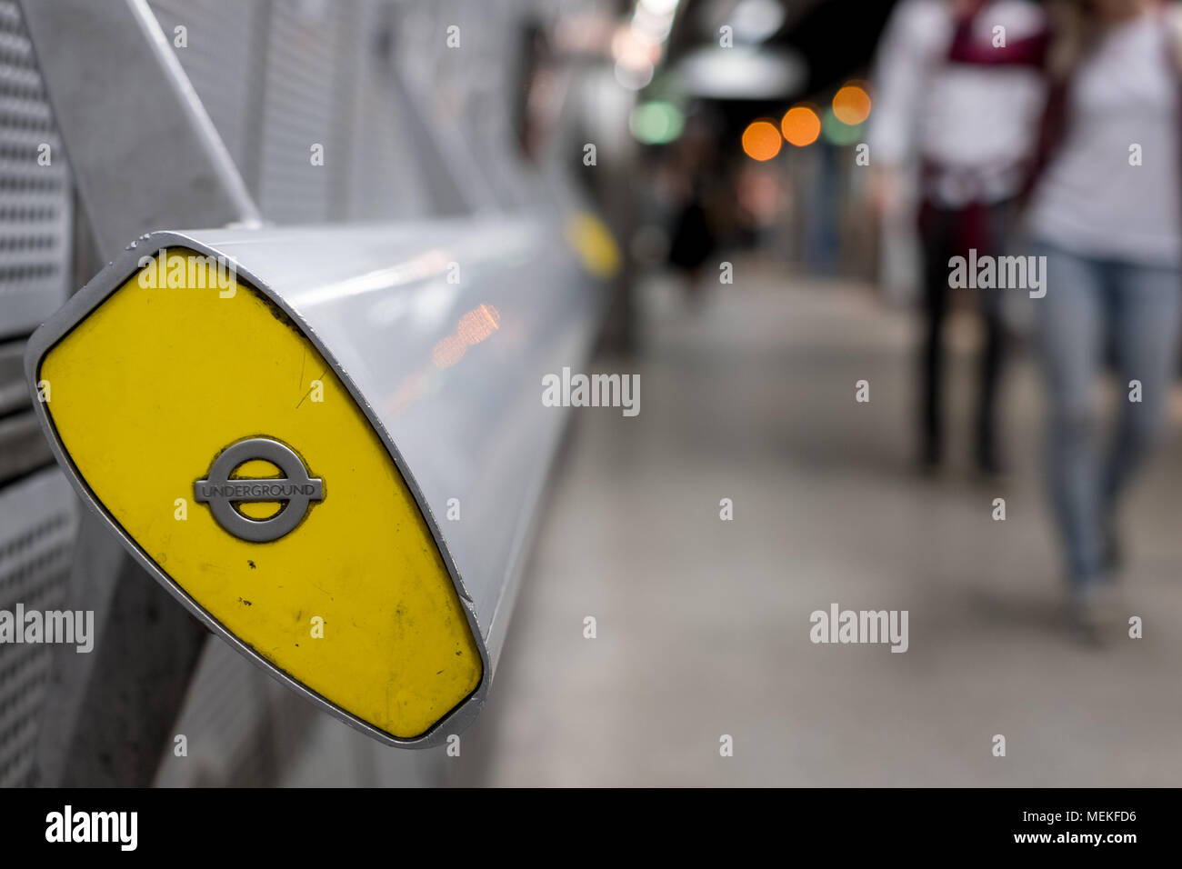 In foreground, end of handrail at Westminster underground station ...