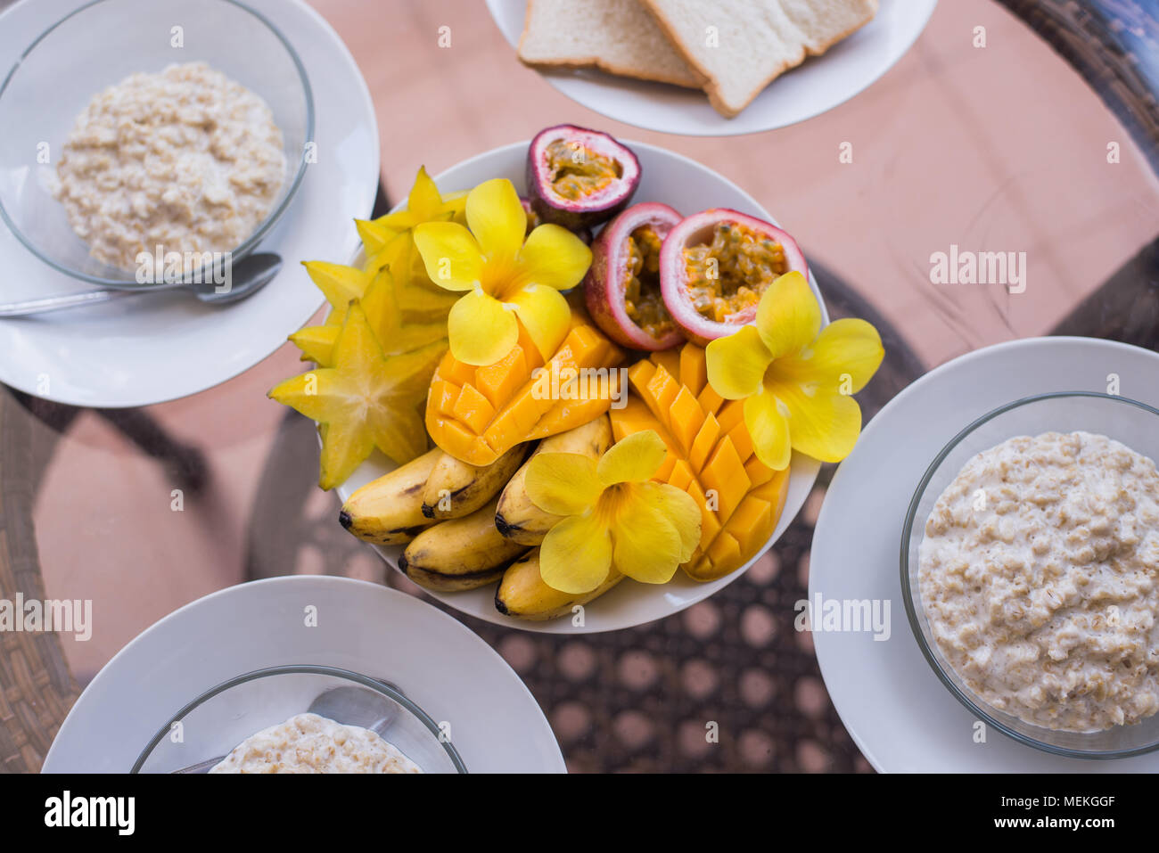 Delicious home breakfast served for three person. Oatmeals porrige and ...