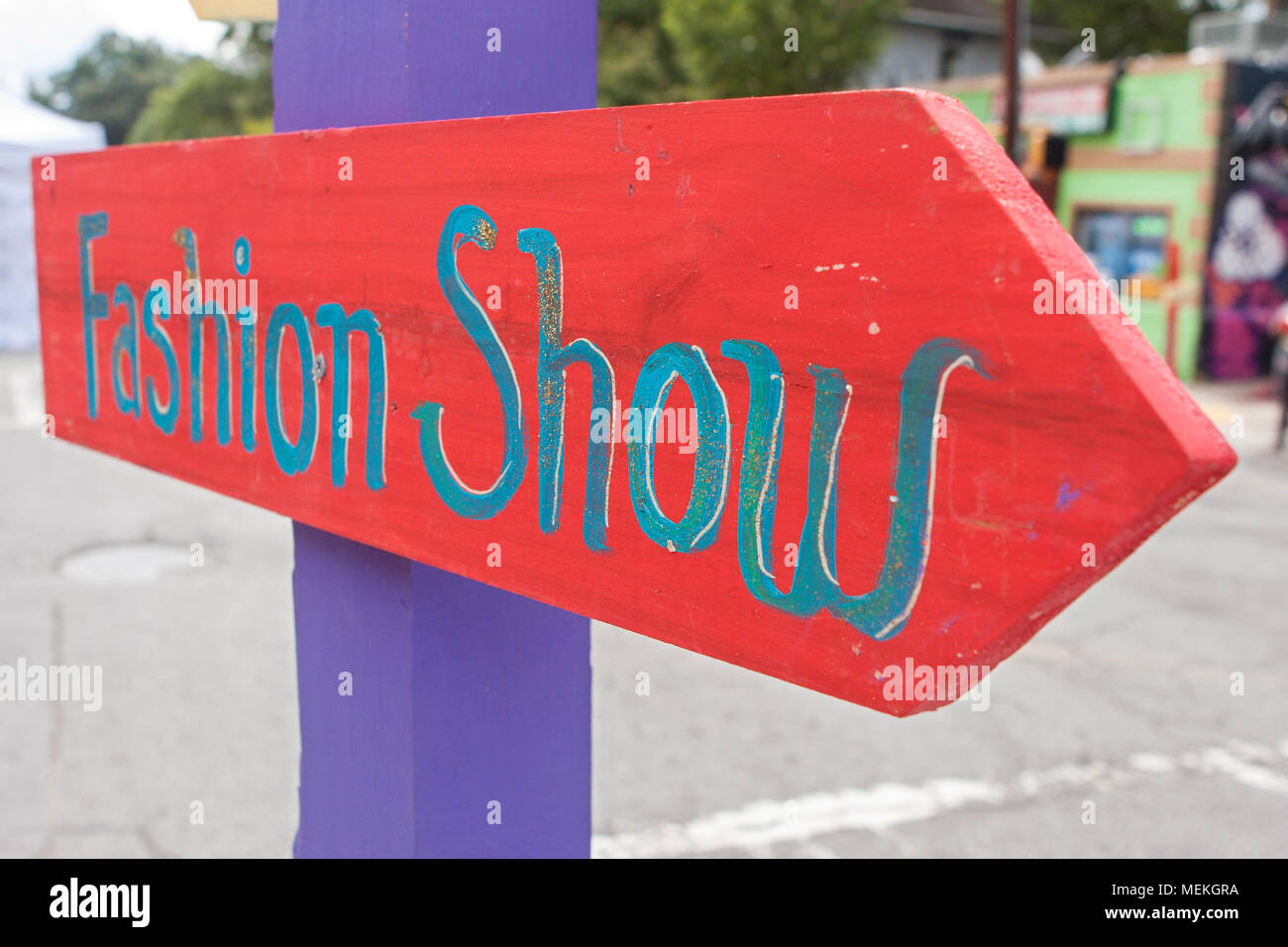 Handmade sign points festival patrons in right direction for fashion ...