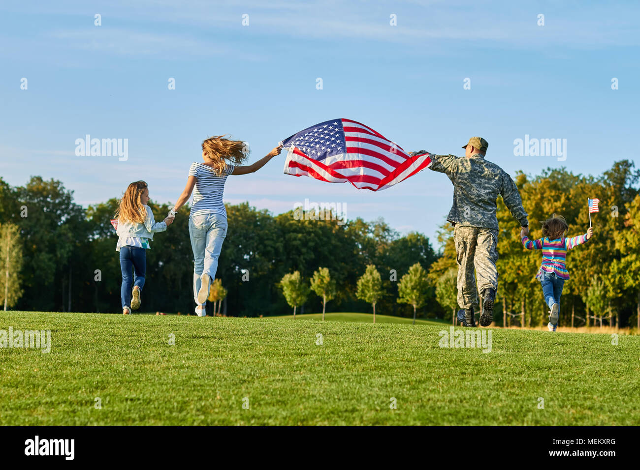 Back view of man with american flag hi-res stock photography and images ...