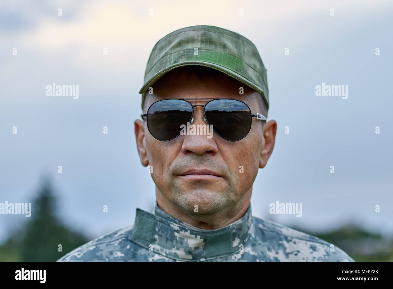 Close up portrait of strong serious soldier Stock Photo - Alamy