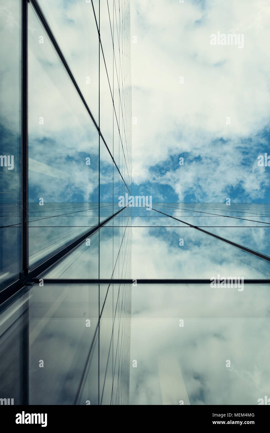 Glass reflection of skyscraper in Paris Stock Photo - Alamy