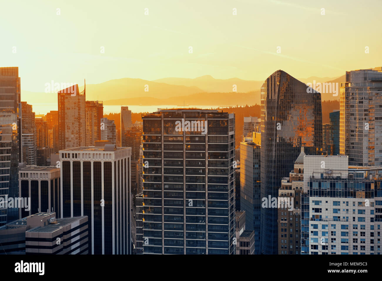 Vancouver rooftop view with urban architectures at sunset Stock Photo ...