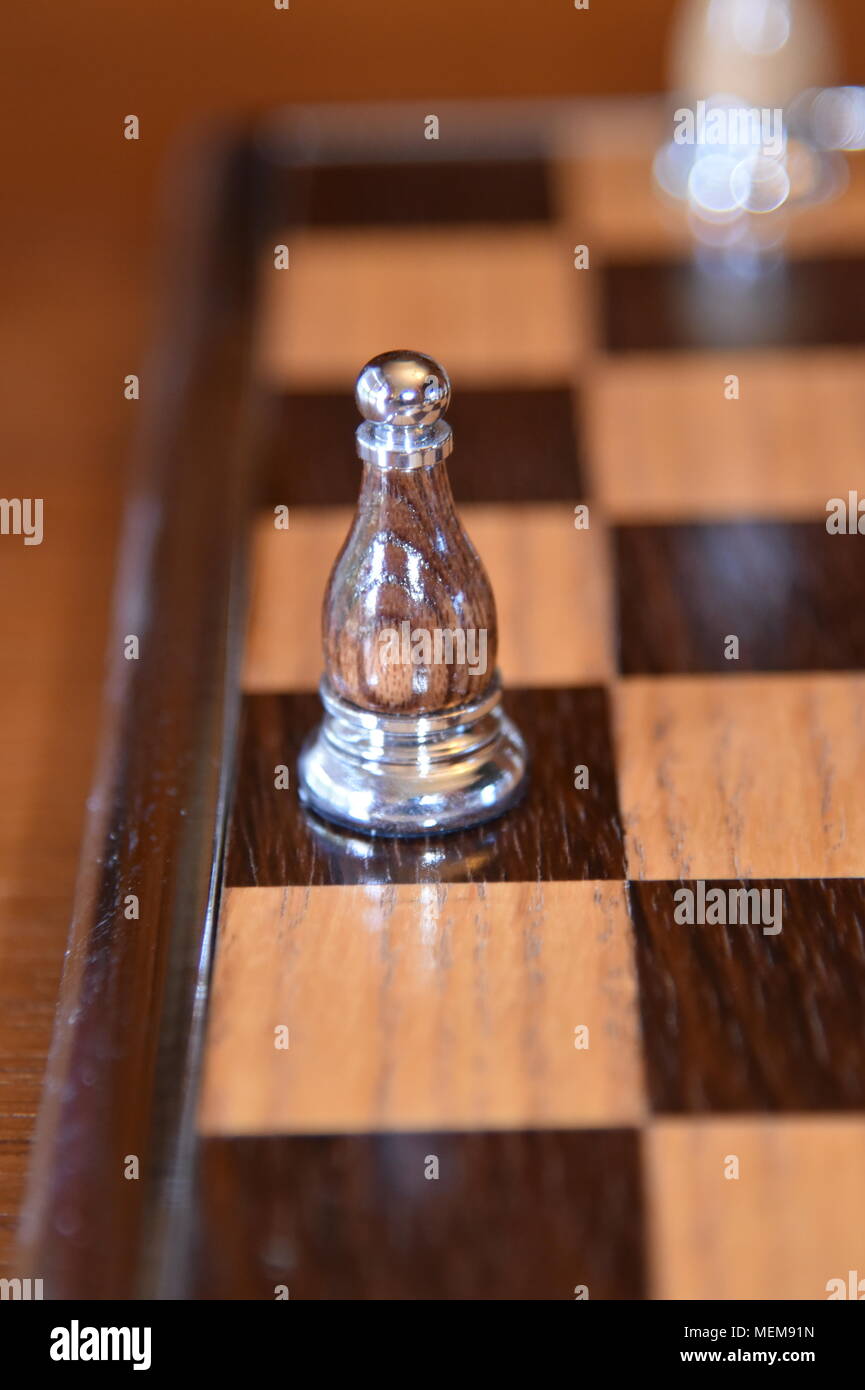 Pawn on chessboard hi-res stock photography and images - Alamy