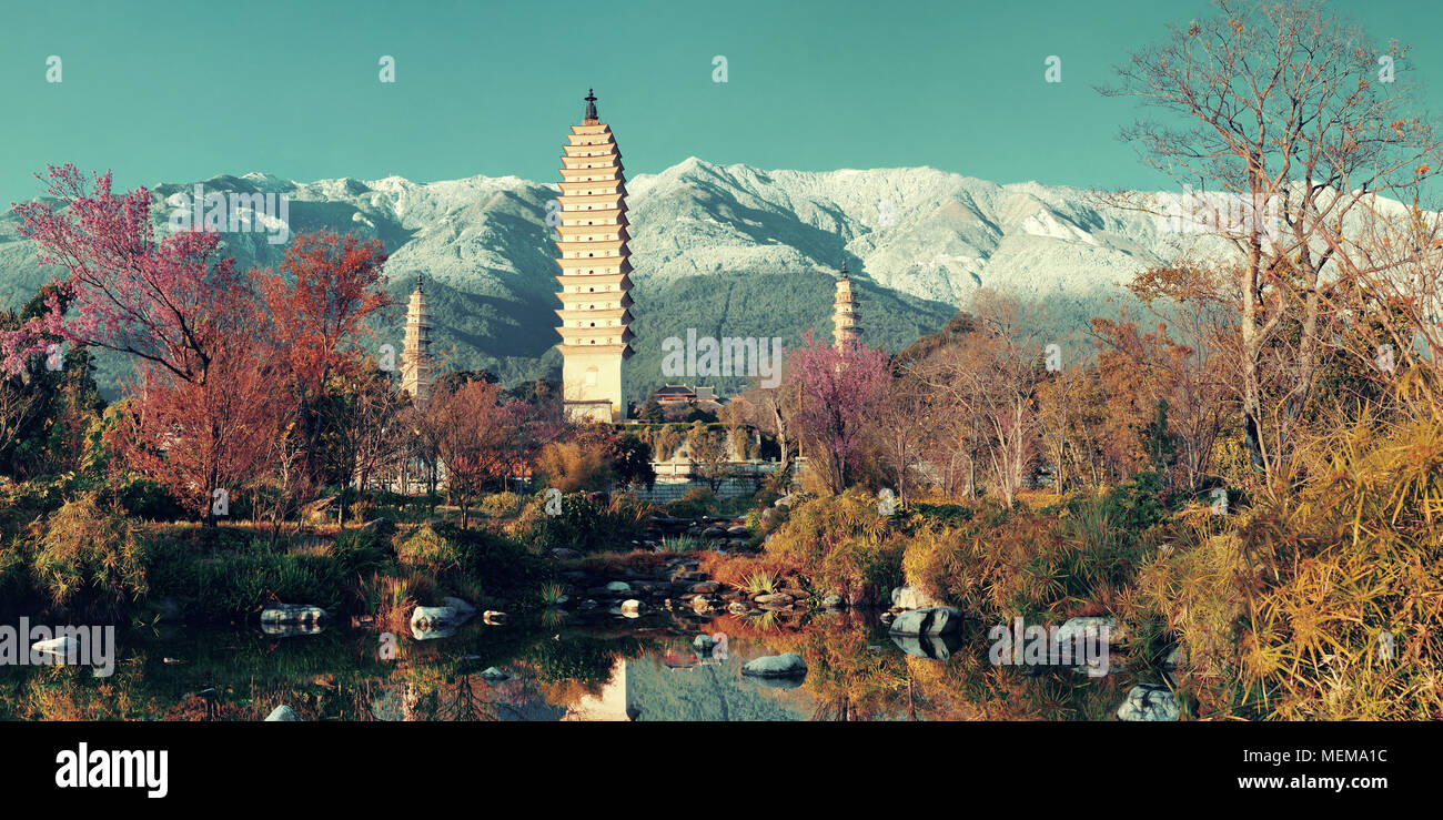 Ancient pagoda in Dali old town with snow capped Mt Cangshan, Yunnan ...