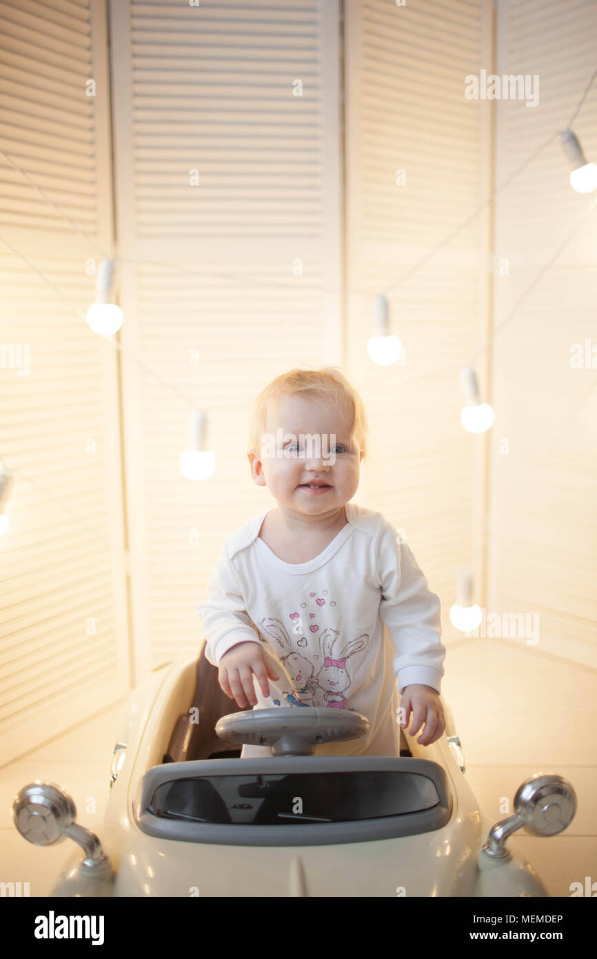 The boy in the children's machine Stock Photo - Alamy