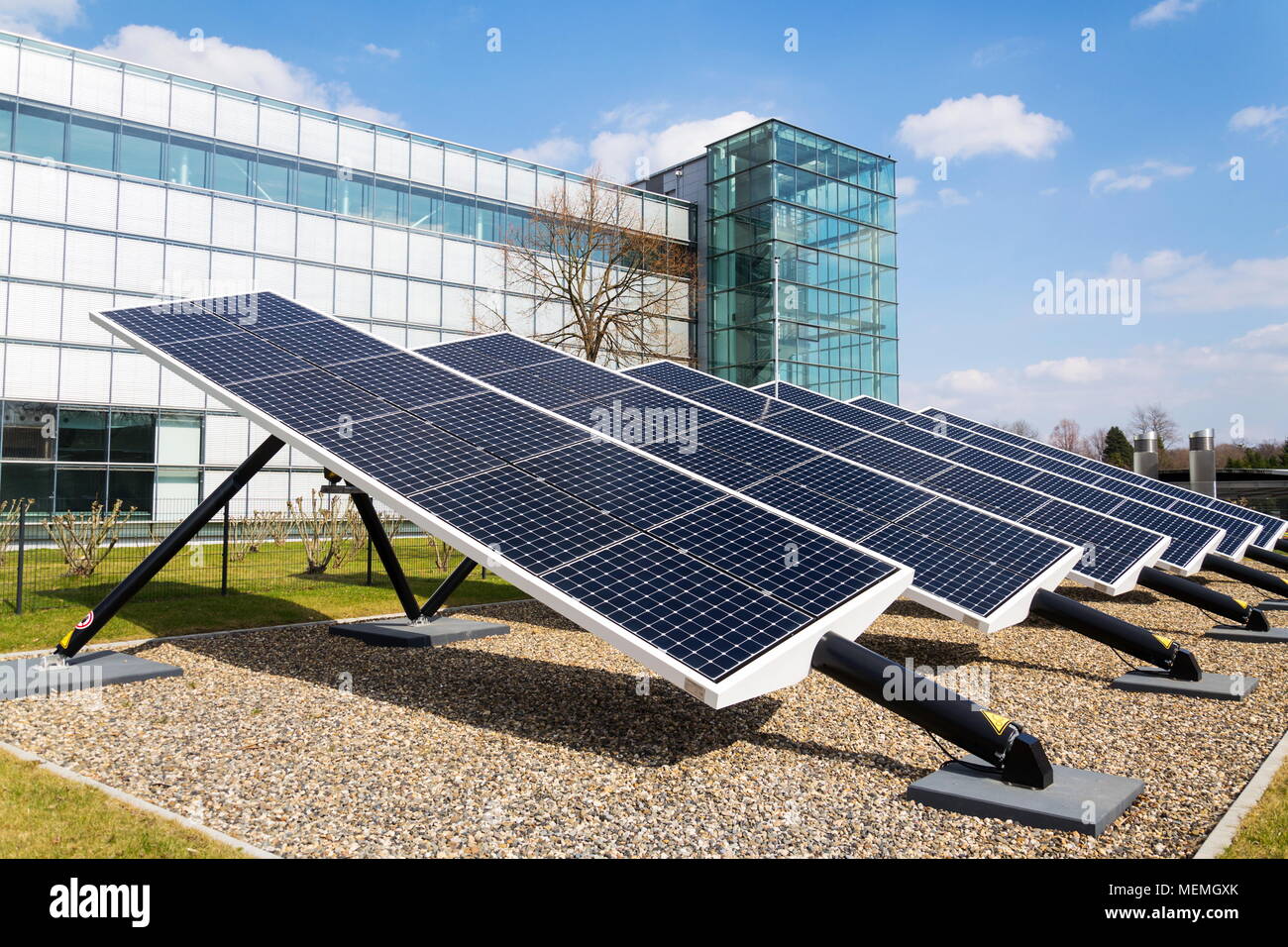 Blue rotating solar panels tilted axis tracker, future energy concept ...