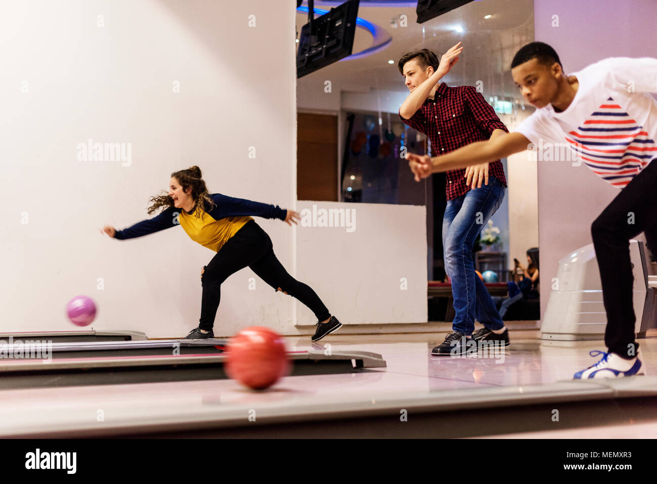 Boy playing bowling alley hi-res stock photography and images - Alamy