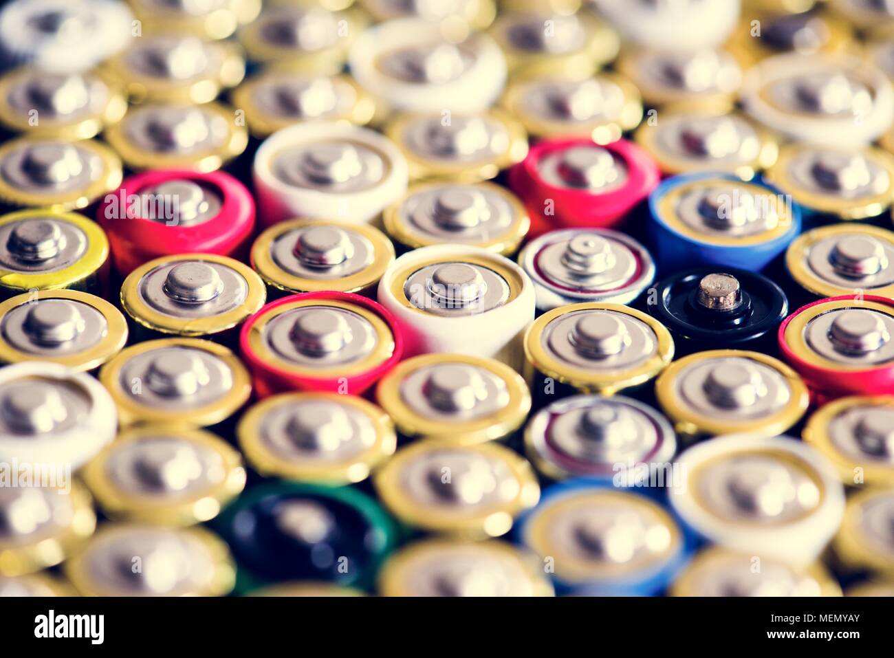 Alkaline battery background Stock Photo - Alamy