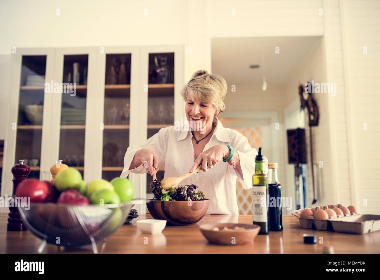 People is cooking in the kitchen Stock Photo - Alamy
