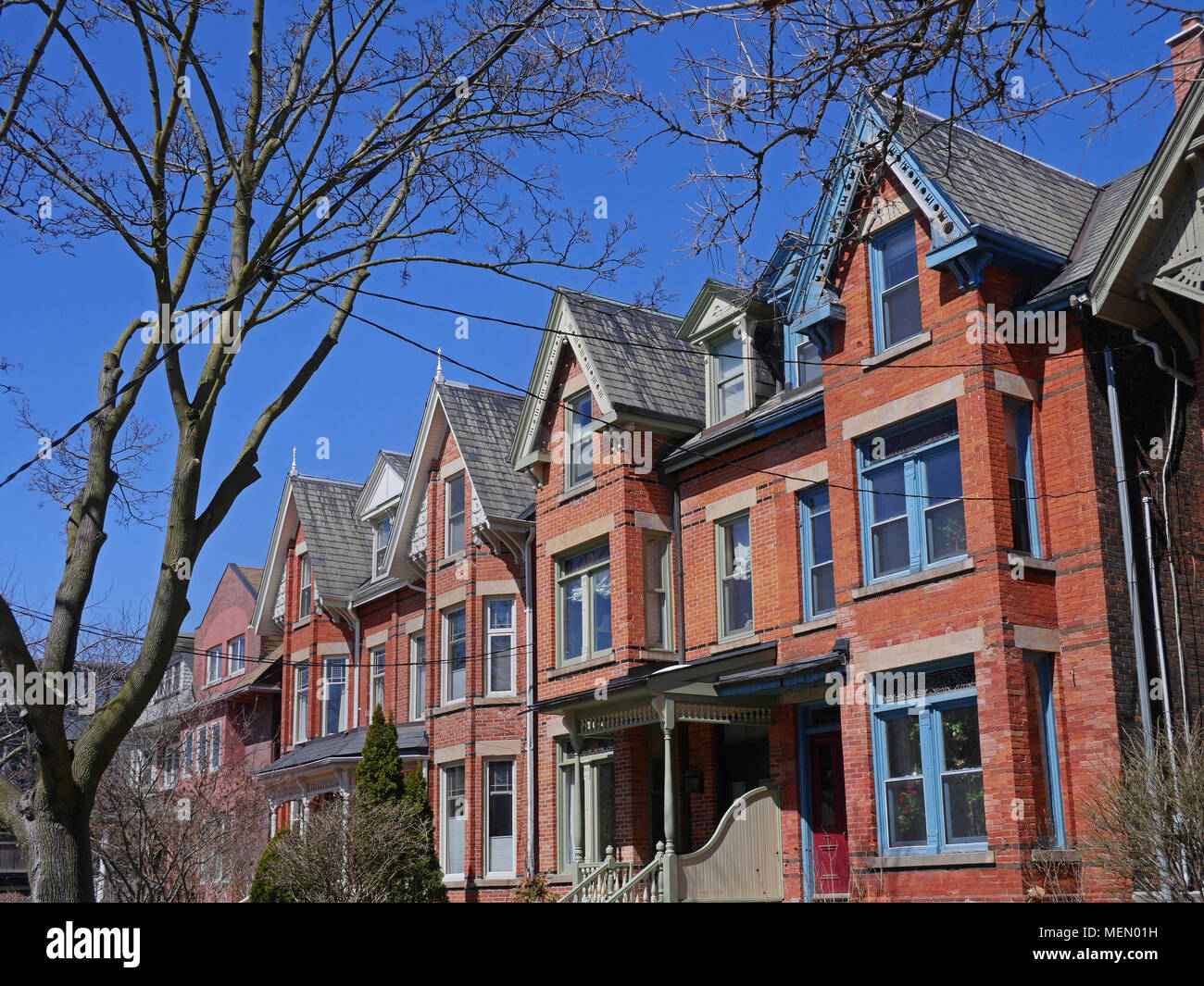 renovated Victorian row houses with gables Stock Photo - Alamy