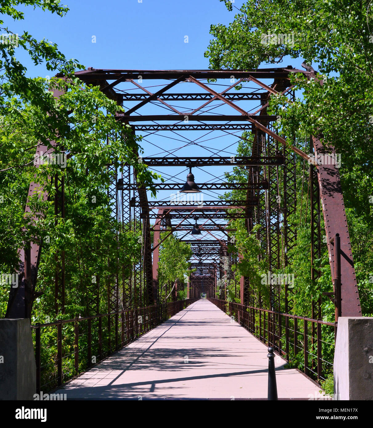 Long walk bridge made of steal and wood that crosses the canadian river ...