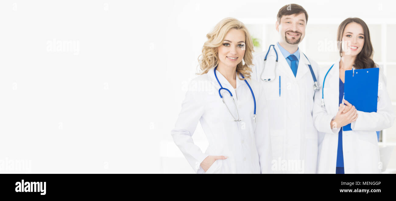 Medical doctors group isolated on white background Stock Photo - Alamy
