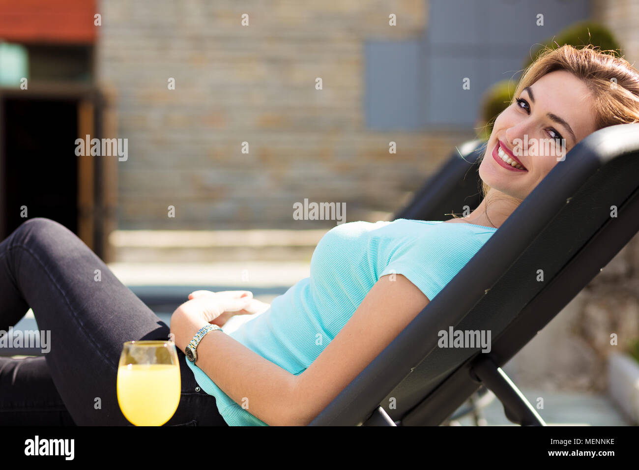 Person lounging in the sun hi-res stock photography and images - Alamy