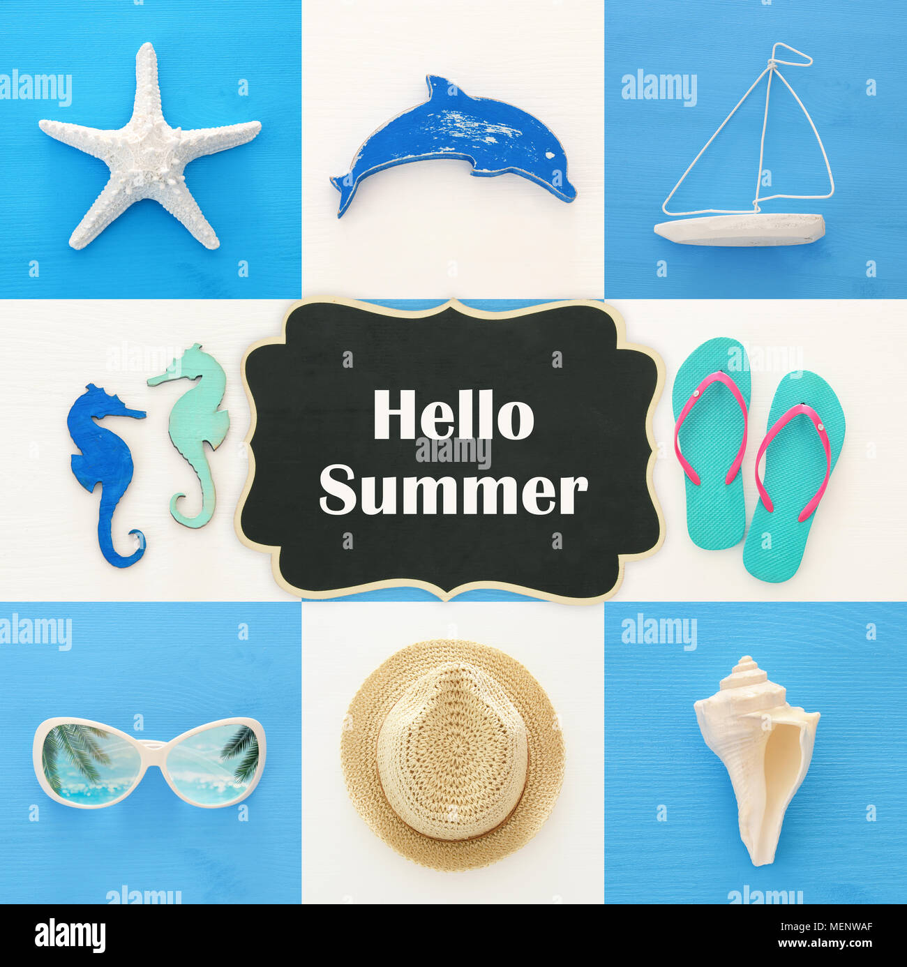 nautical collage with sea life style objects over blue and white wooden ...