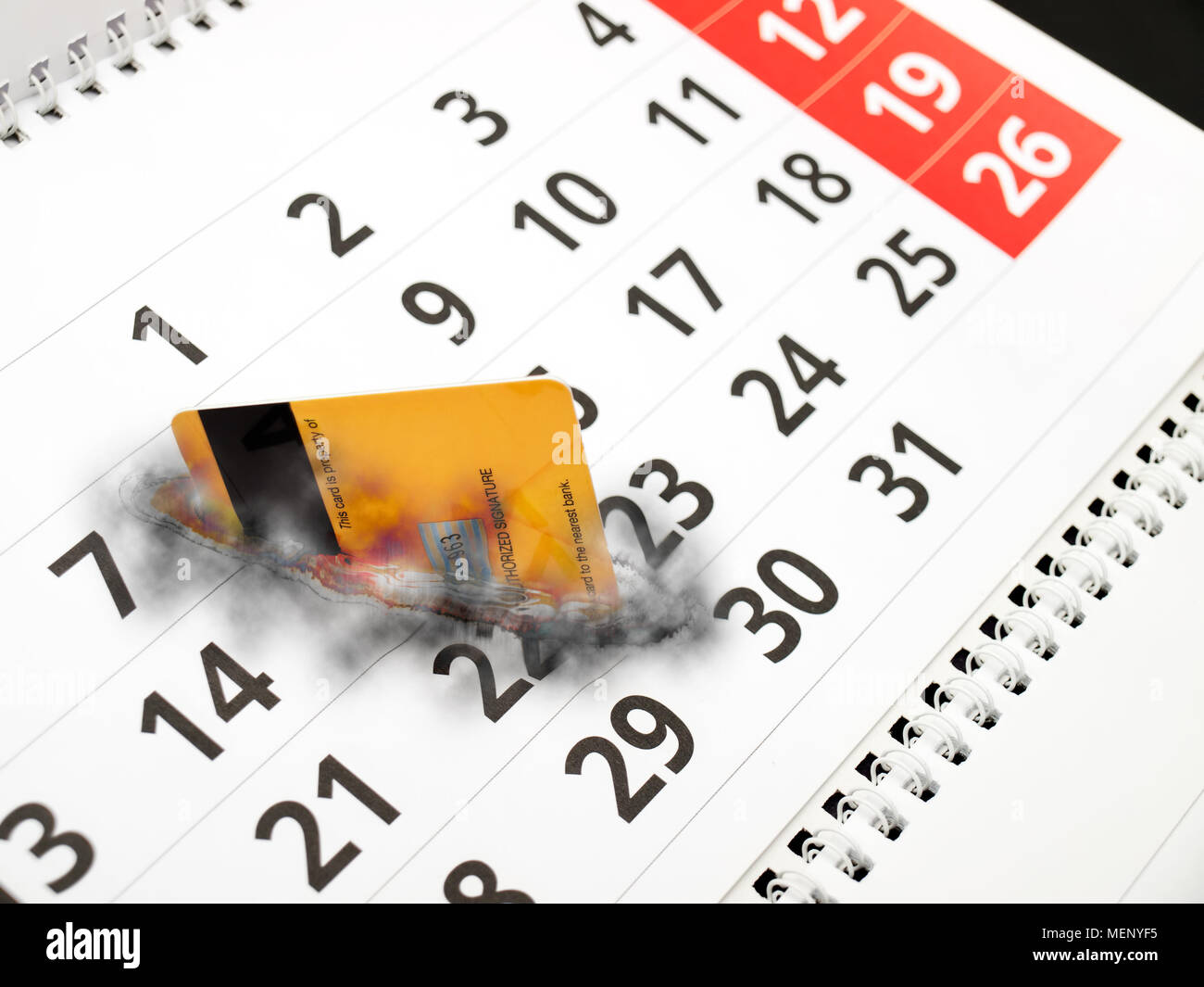 Credit card is emerging in the calendar on a payment date Stock Photo ...
