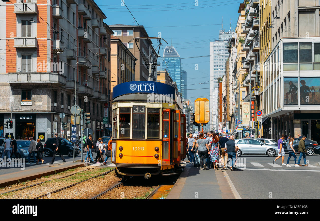 Milan, Italy - April 21st, 2018: Passengers boarding a traditional ...