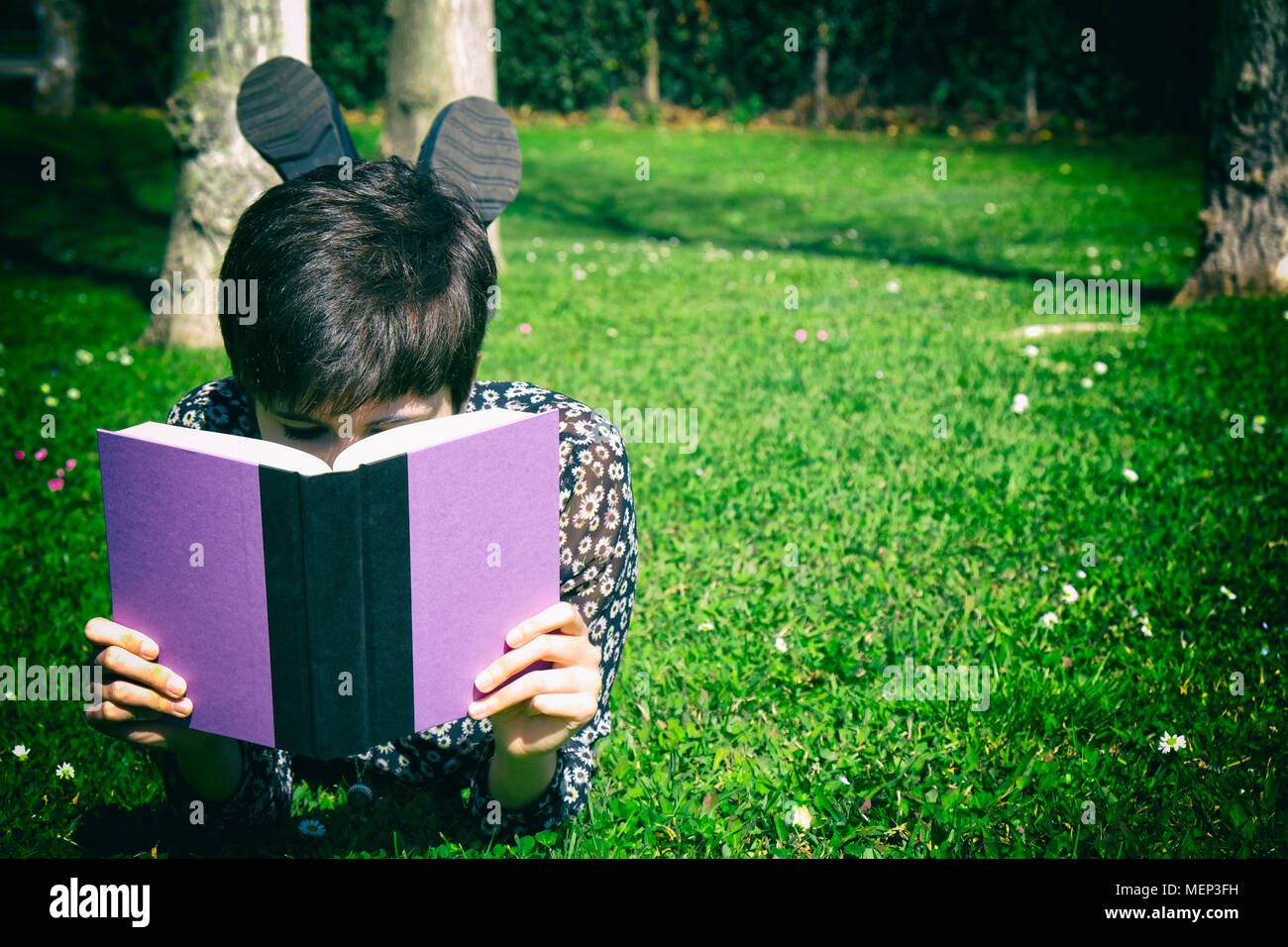 Attractive girl lying on her front hi-res stock photography and images ...