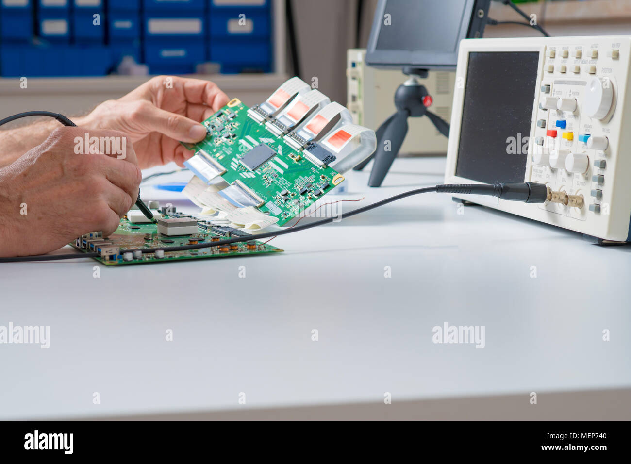 To repair the PCB of a modern monitor at the service center. Laboratory ...