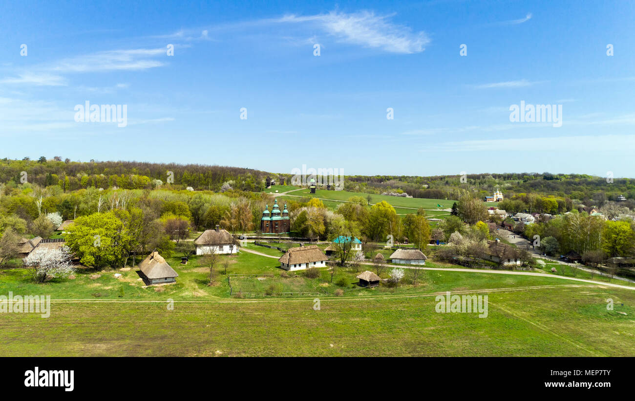 Aerial view over traditional Ukrainian village in spring, Pirogovo ...