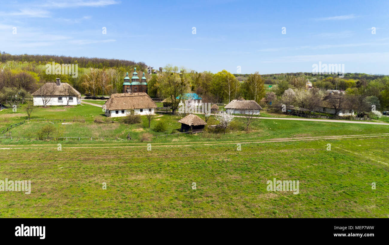 Aerial view over traditional Ukrainian village in spring, Pirogovo ...