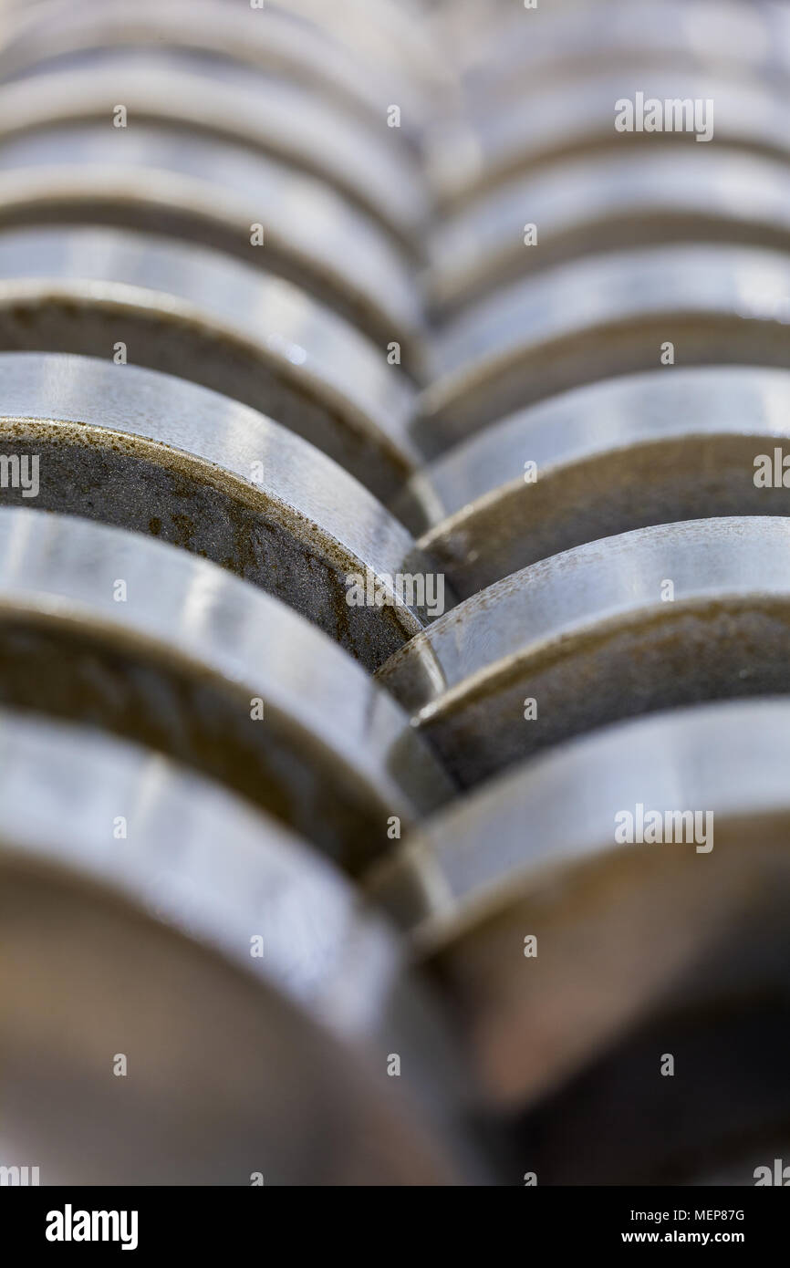 Intermeshing double helical screw used in a dough extruding machine ...