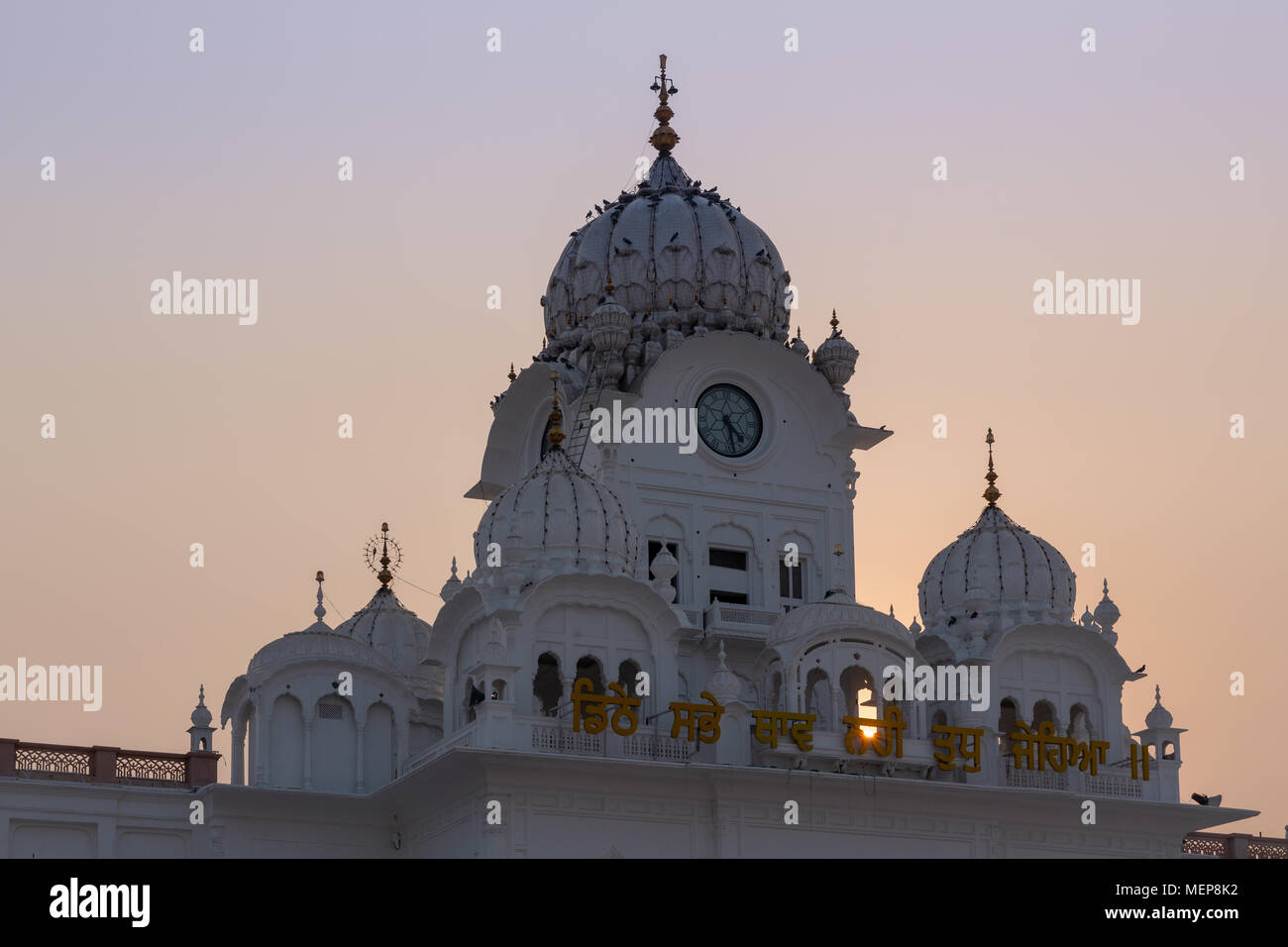 Sunset at the Clock Tower entrance to the Golden Temple,Sri Harmandir ...