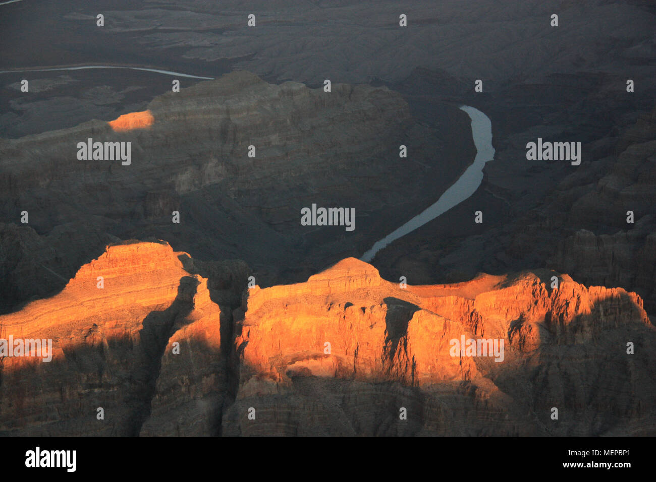 First Sun Rays of the Day illuminating a Rock Formation while the ...