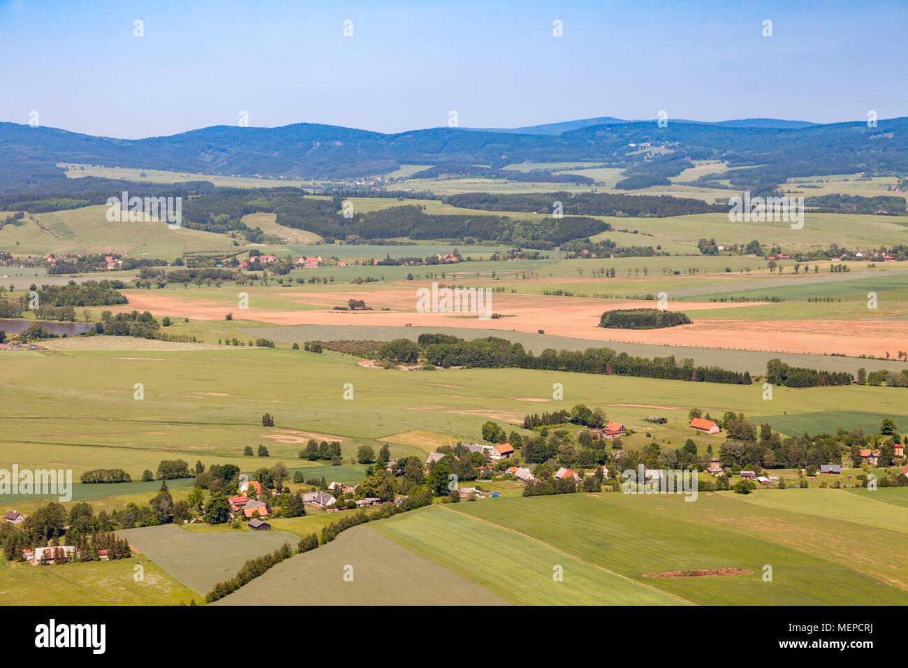 Aerial view of farmland and villages in the Czech countryside of ...