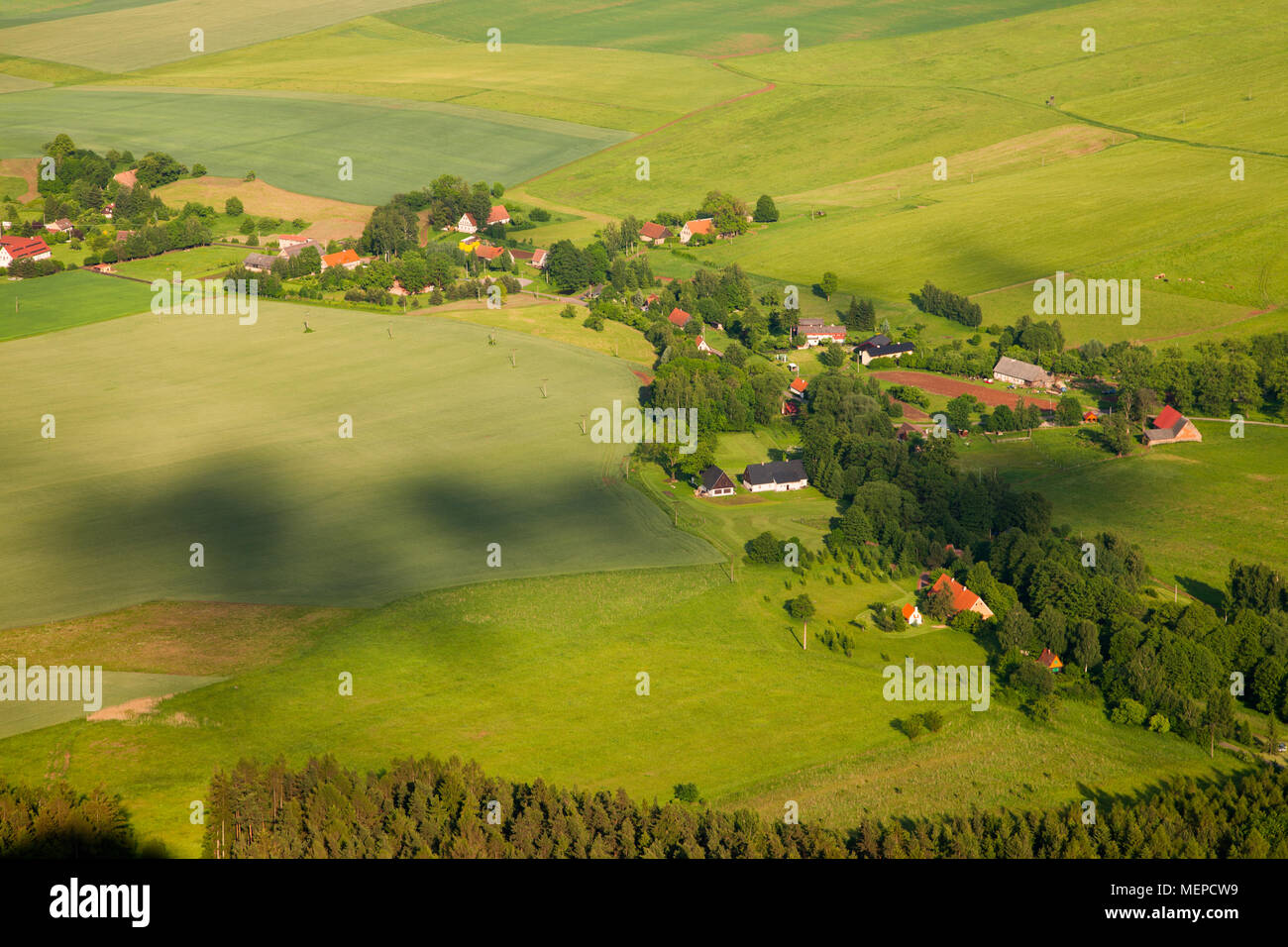 Aerial view of farmland and villages in the Czech countryside of ...