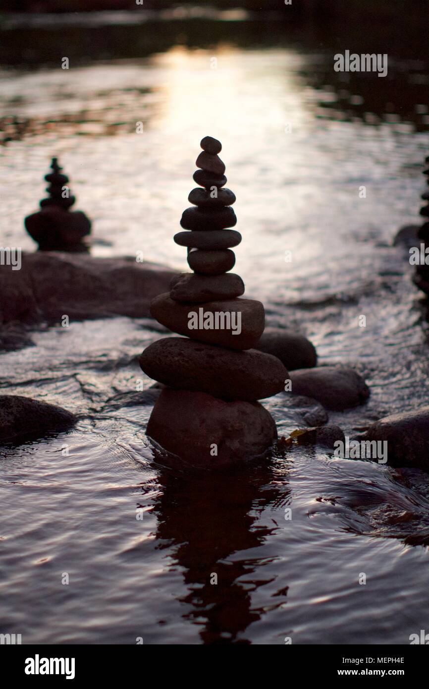 Cairns marking a path near water Stock Photo - Alamy