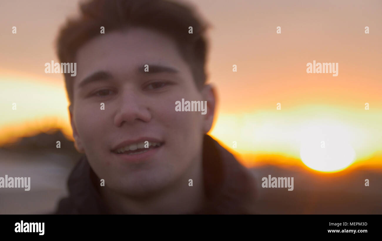 Man happy sunset slow motion hi-res stock photography and images - Alamy